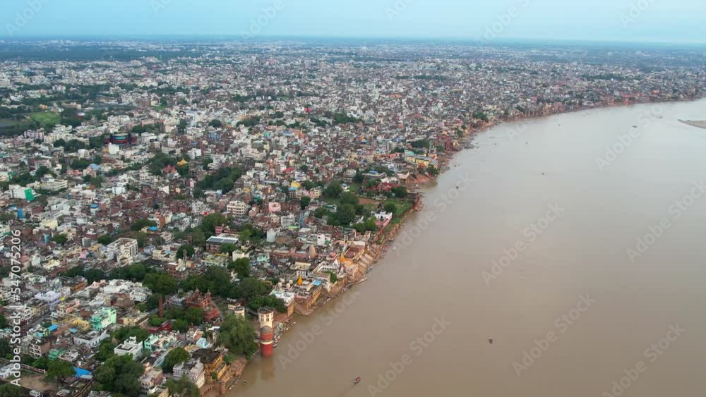 Aerial video 4k of Varanasi city with Ganges river, ghats, the houses ...