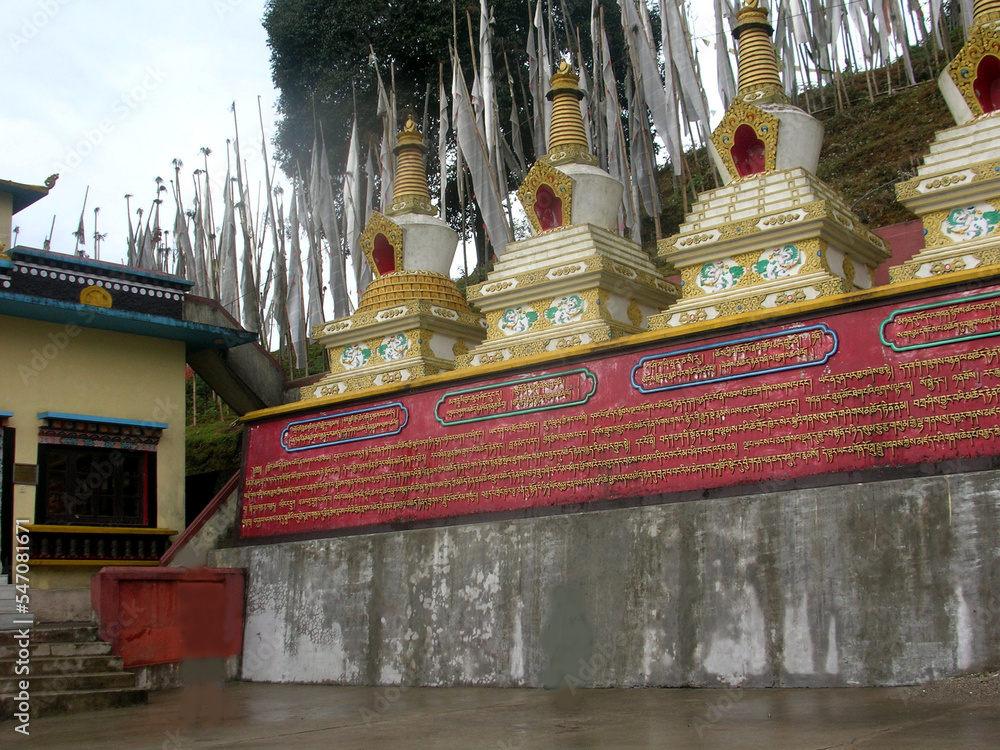 The array of Buddhist stupas build the premises of the monastery look ...