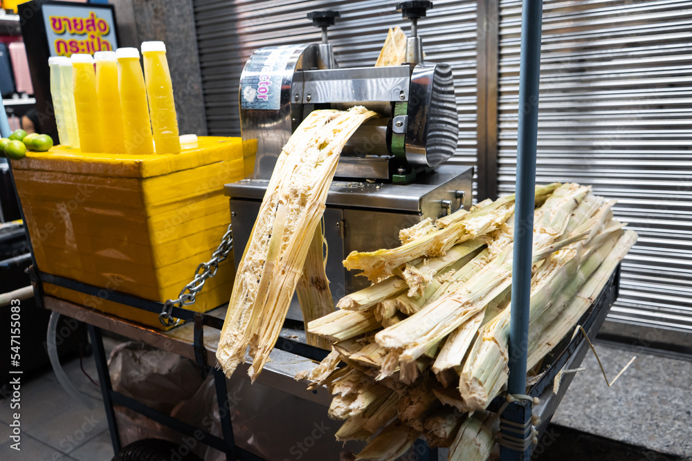 Cane making juice machine at the bar Stock Photo | Adobe Stock