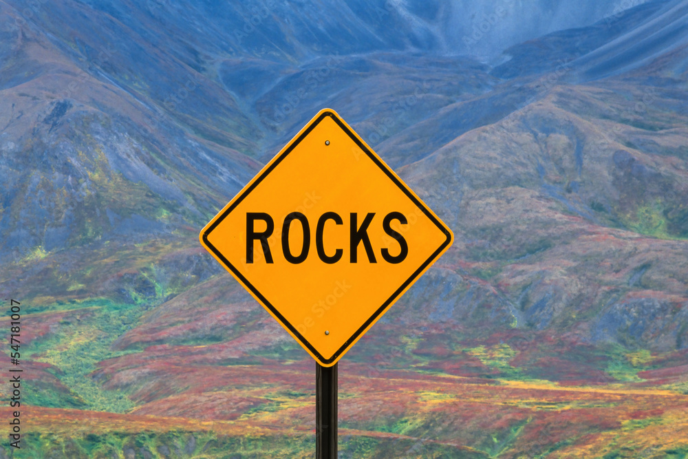 Warning sign for falling rocks Stock Photo | Adobe Stock
