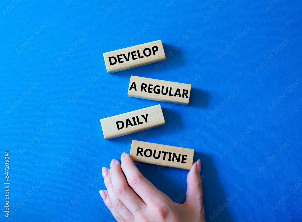 Develop a regular daily routine symbol. Concept words Develop a regular ...