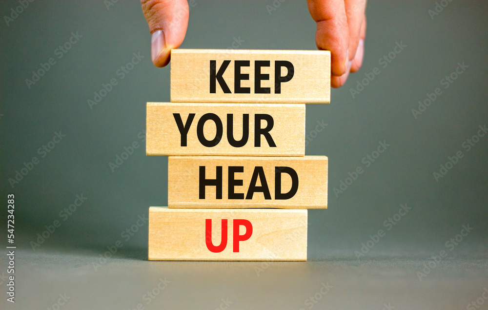 Keep your head up symbol. Concept words Keep your head up on wooden ...