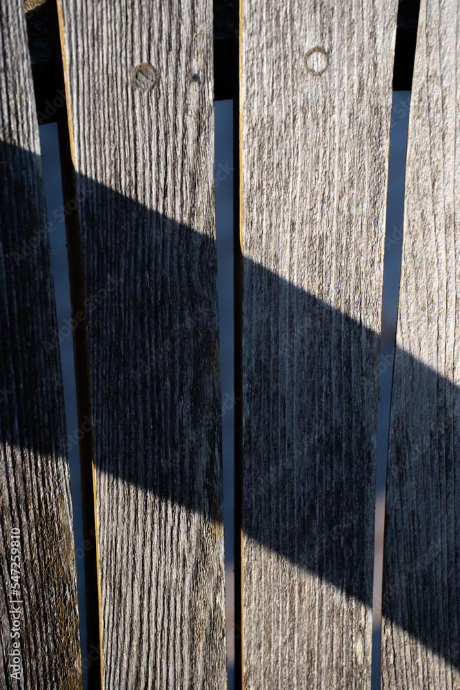 abstract close up of wooden cottage chair with wood grain and shadow ...