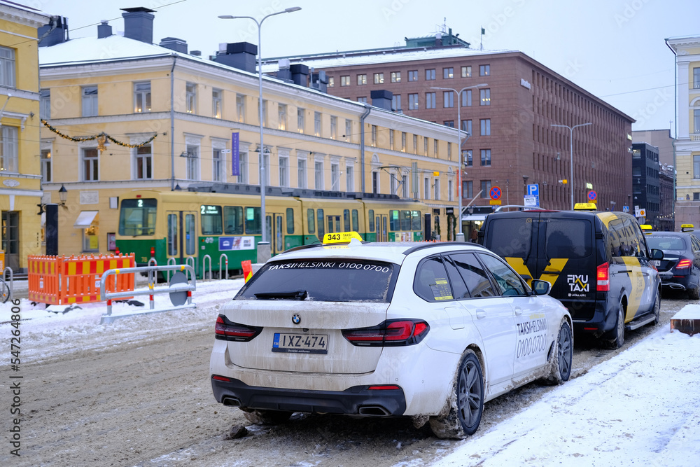 Finnish car with sign Taxi waits for passengers on street of Helsinki ...