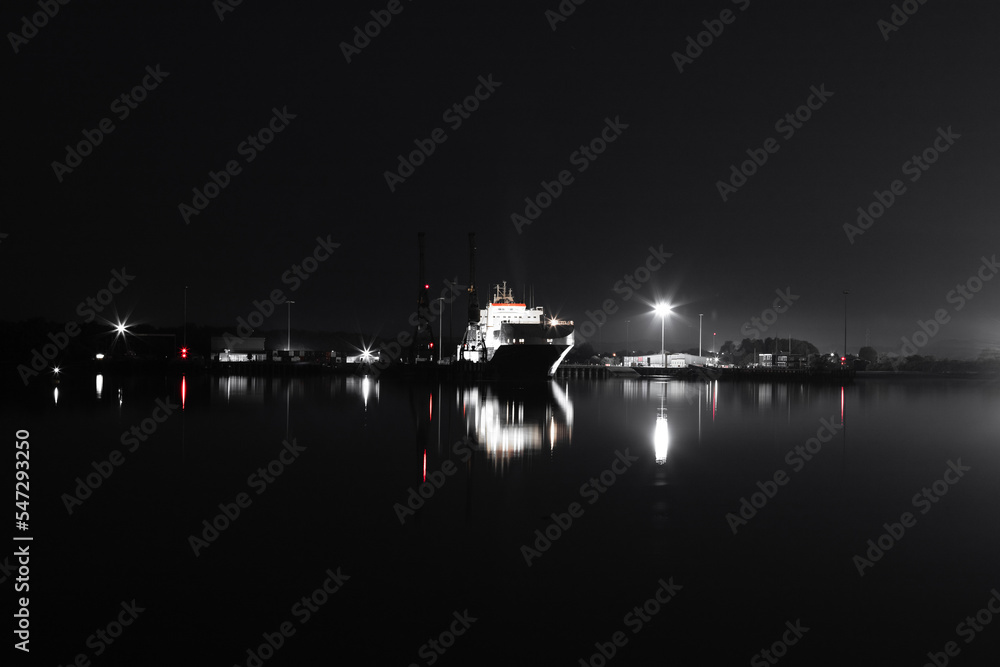 Black & white industrial boat at night Stock Photo | Adobe Stock