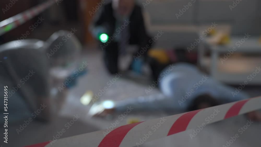 Forensic Crime Police Investigators examine evidence at the crime scene ...