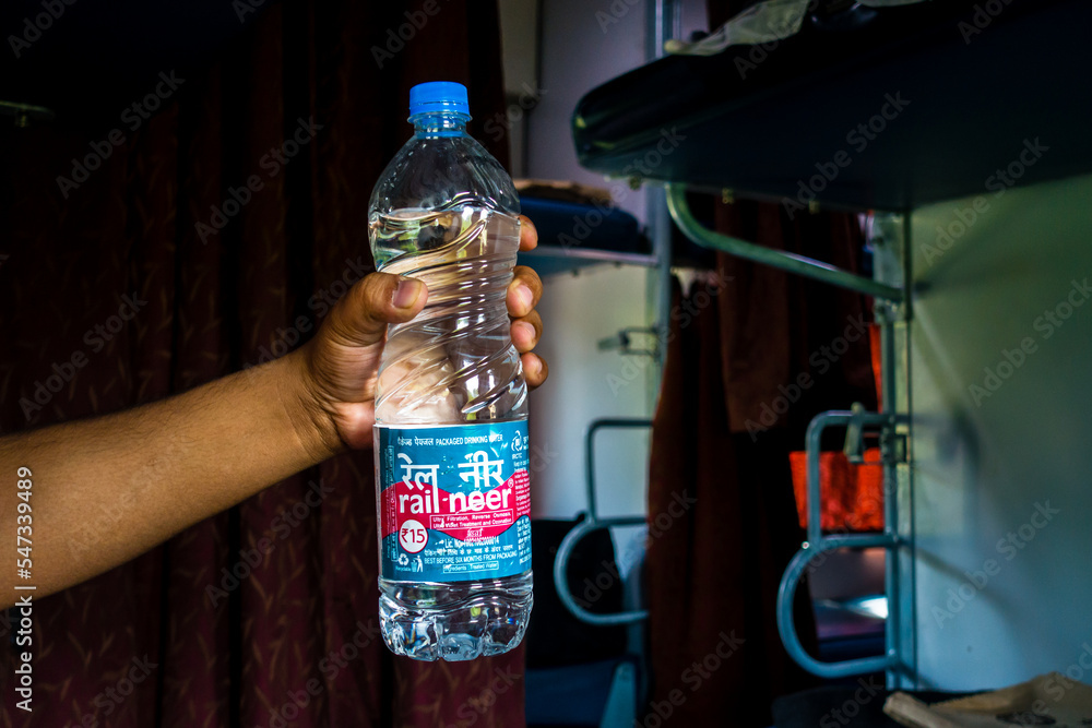 July 4th 2022 Haridwar India. A man holding Rail Neer packaged drinking ...