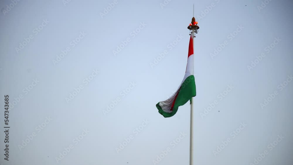 Indian tri color with saffron green white and ashoka chakra waving in ...