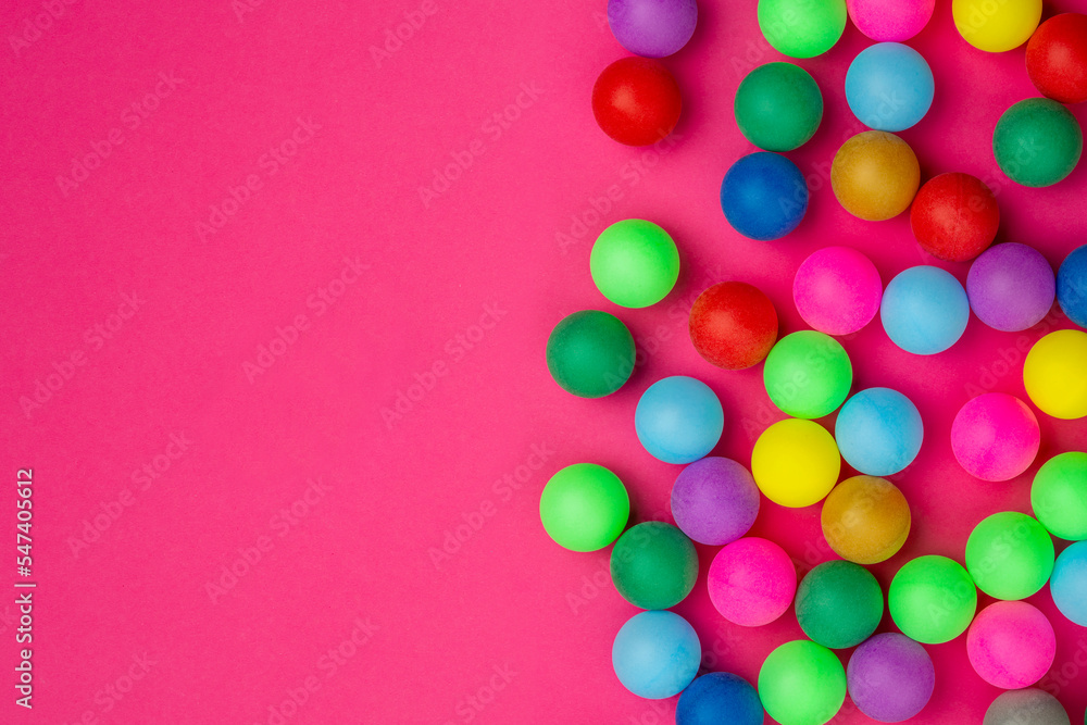 Abstract colored balls background. Multi-colored taw toy scattered on ...