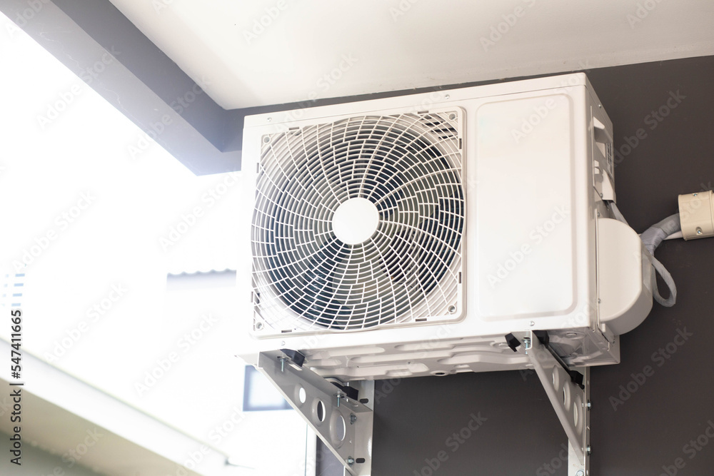 Condensing unit of air conditioning system mounted on outdoor wall, air ...