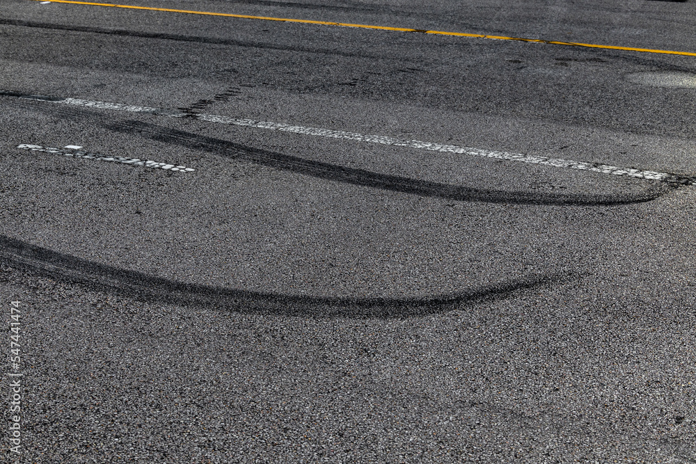 Tire track mark on asphalt tarmac road race track texture and ...