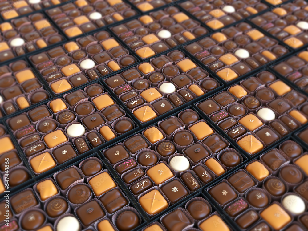 Box with chocolate candies rows. Assortment of chocolate candies, white ...