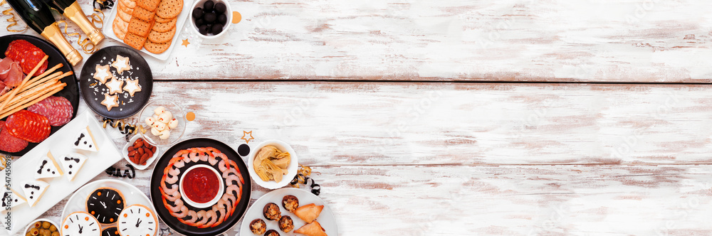 New Years Eve theme appetizer corner border. Top down view on a white ...