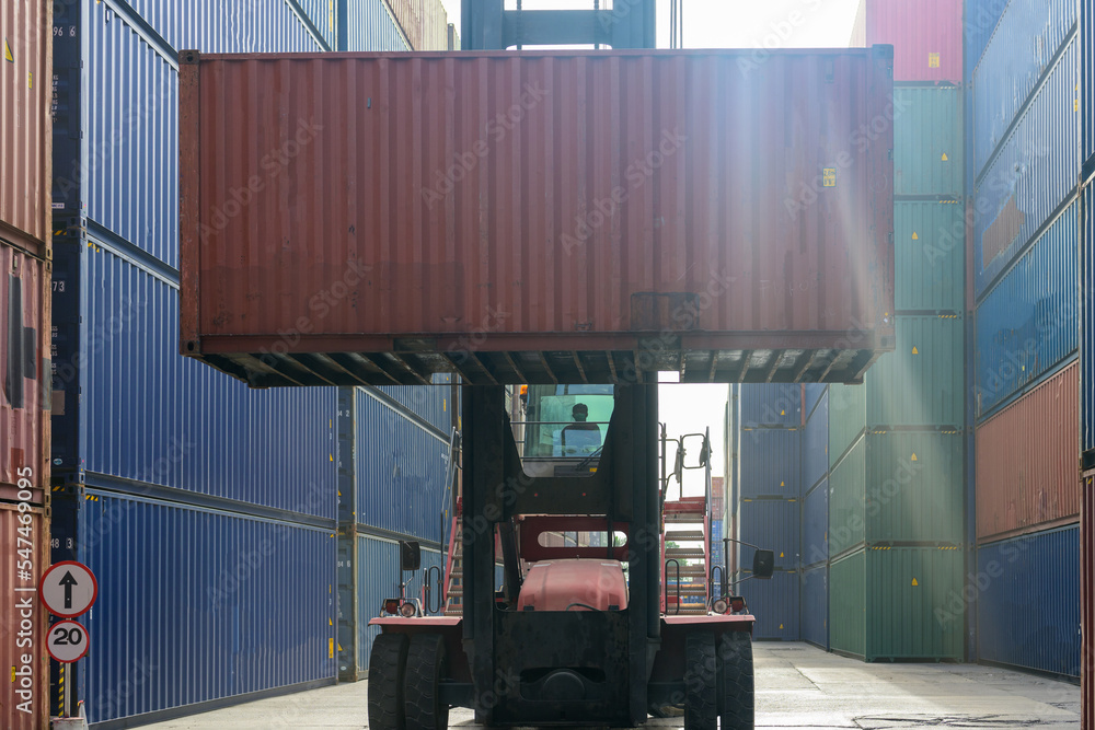 Industrial forklift truck loading container box at yard, Crane lifting ...