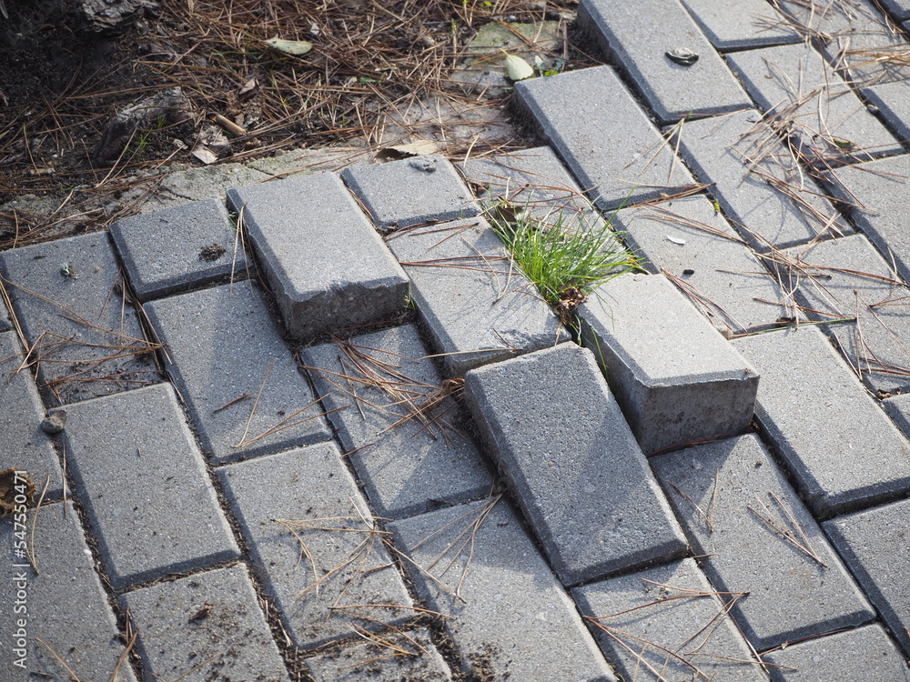 Foto de broken concrete pathway brick surface background, close up ...