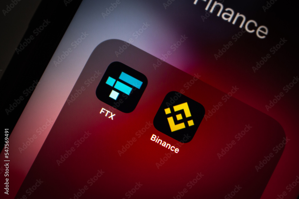 Vancouver, CANADA - Nov 19 2022 : Icons of FTX and Binance are seen in an iPhone screen ...