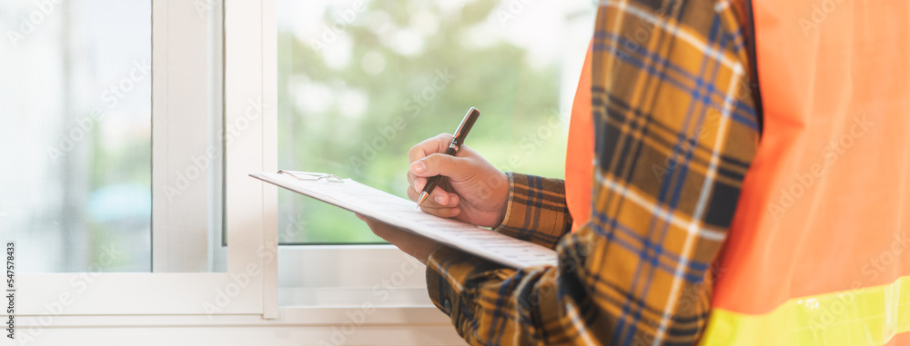 Building inspection, asian contractor young man, male inspecting home ...