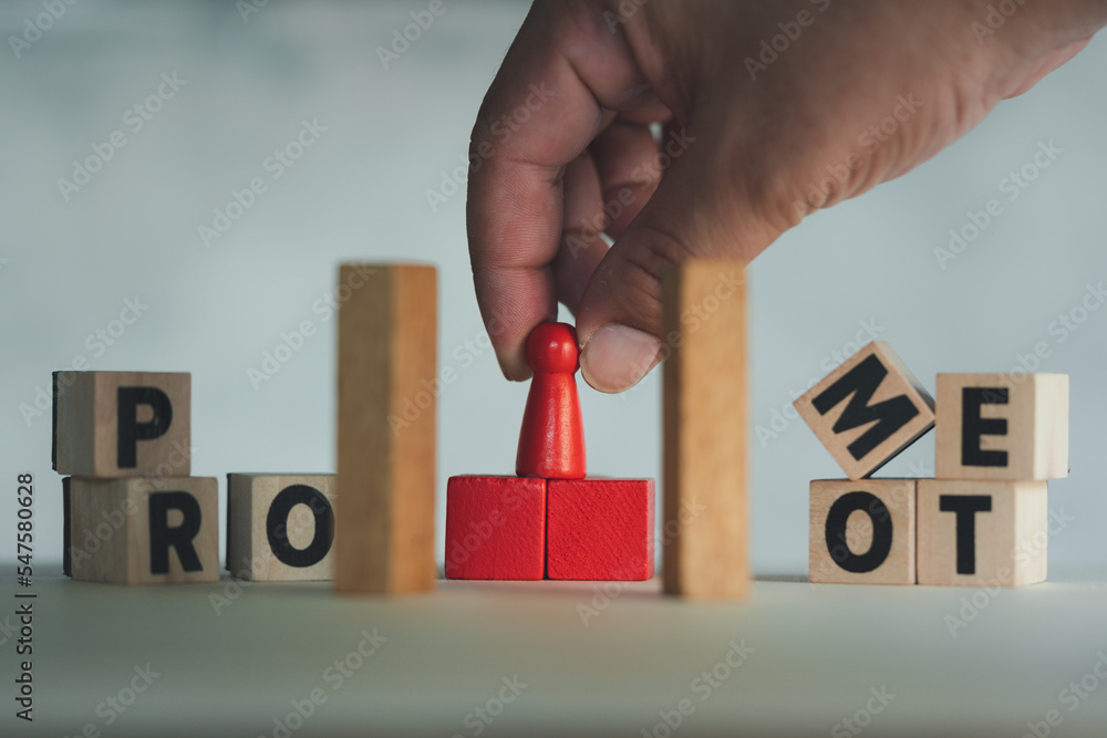 Hand arranging and choosing people for promotion. Ladder career path ...