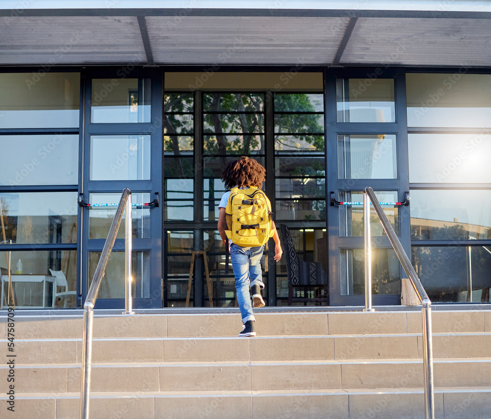 Child, walking and school entrance for education, learning or childhood ...