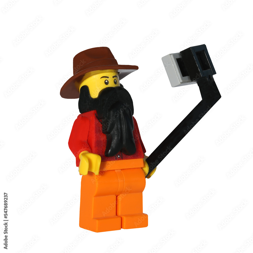 Lego minifigure taking a selfie with selfie stick Stock Photo | Adobe Stock