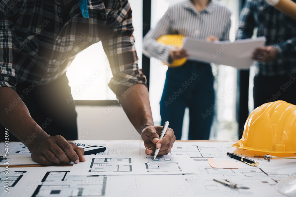 Architecture Engineer Teamwork Meeting, Drawing and working for ...