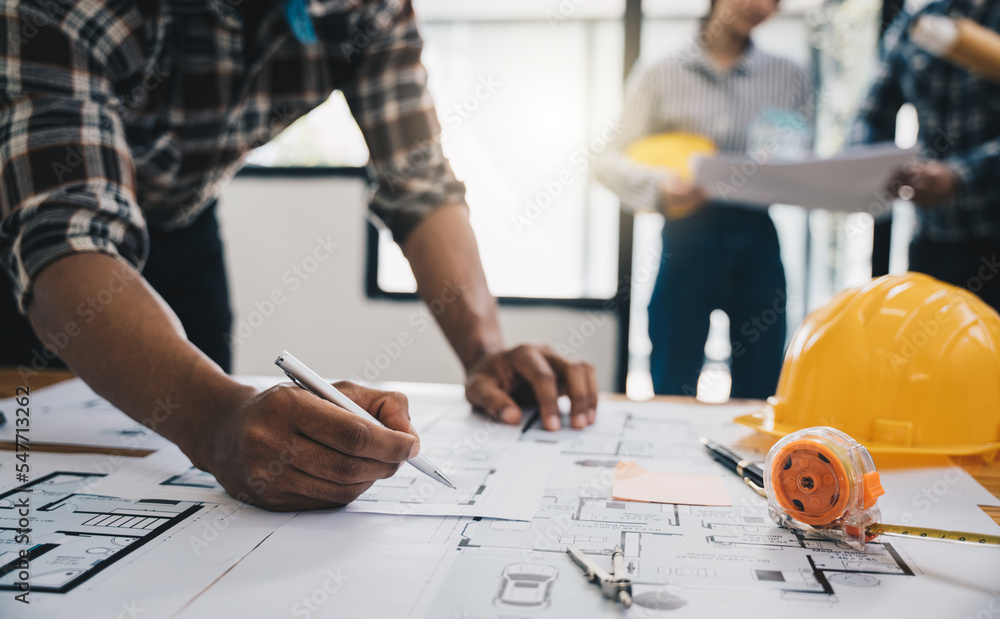 Architecture Engineer Teamwork Meeting, Drawing and working for ...