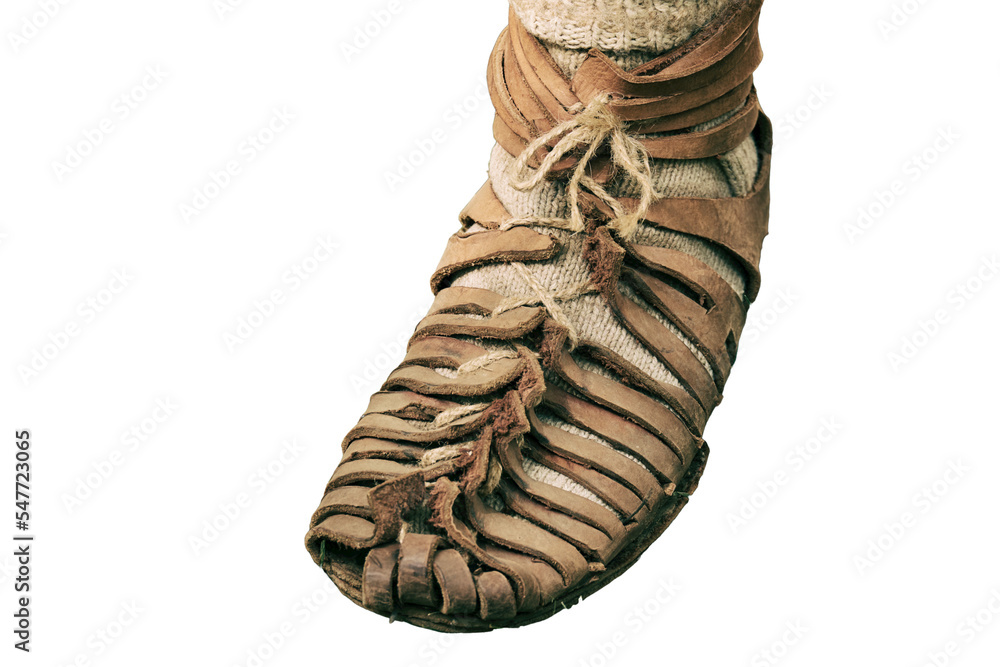 An ancient Roman man legs in caligae leather sandals, isolated on a ...