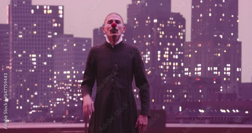 Clown funny mime behind an invisible glass box or wall pulling a rope ...