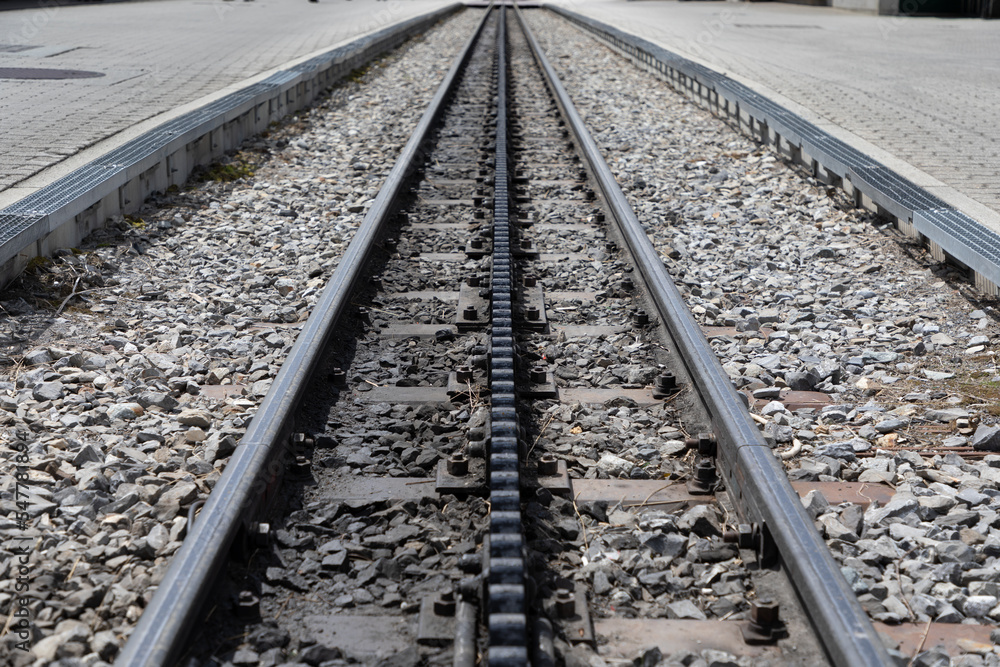Selective focus, diminishing perspective train tracks with a centre ...
