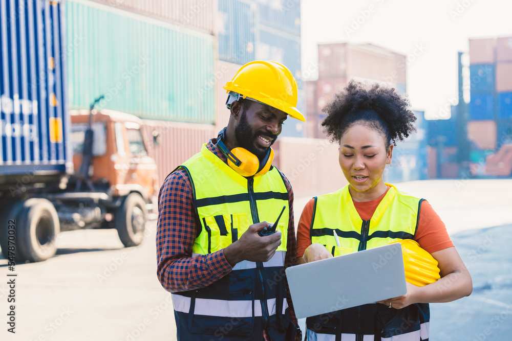 African black worker couple coworking team together at port cargo ...