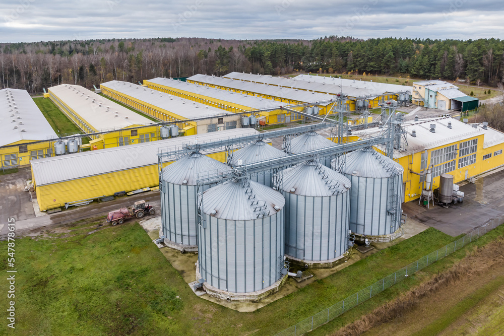 aerial panoramic view over silos and agro-industrial livestock complex ...