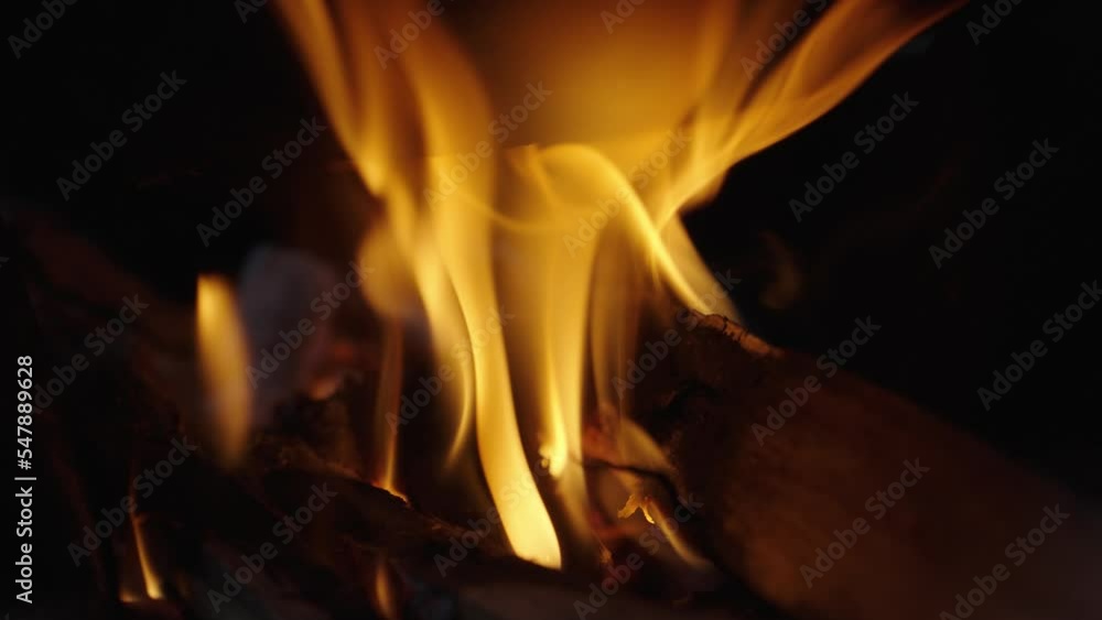 Slow motion Flames burning high in a charcoal stove,Fire flames ...