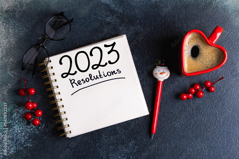 New year resolutions 2023 on desk. 2023 resolutions list with notebook ...