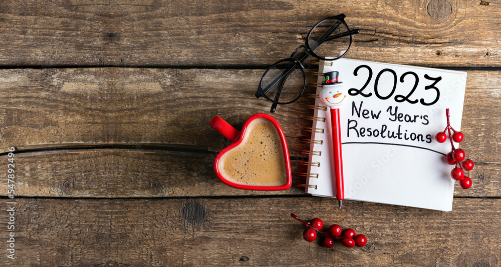 New year resolutions 2023 on desk. 2023 resolutions list with notebook ...