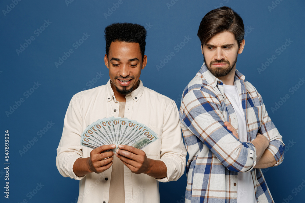 Young two friends envious grumpy men 20s wear white casual shirts ...