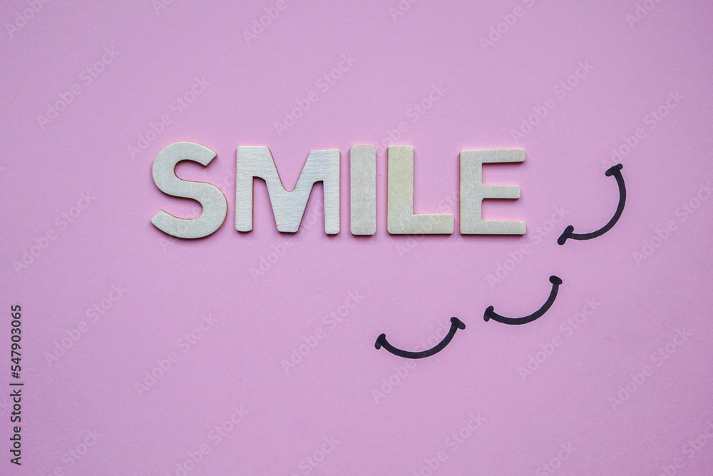 smile word on the pink background, feelings and emotions Stock Photo ...