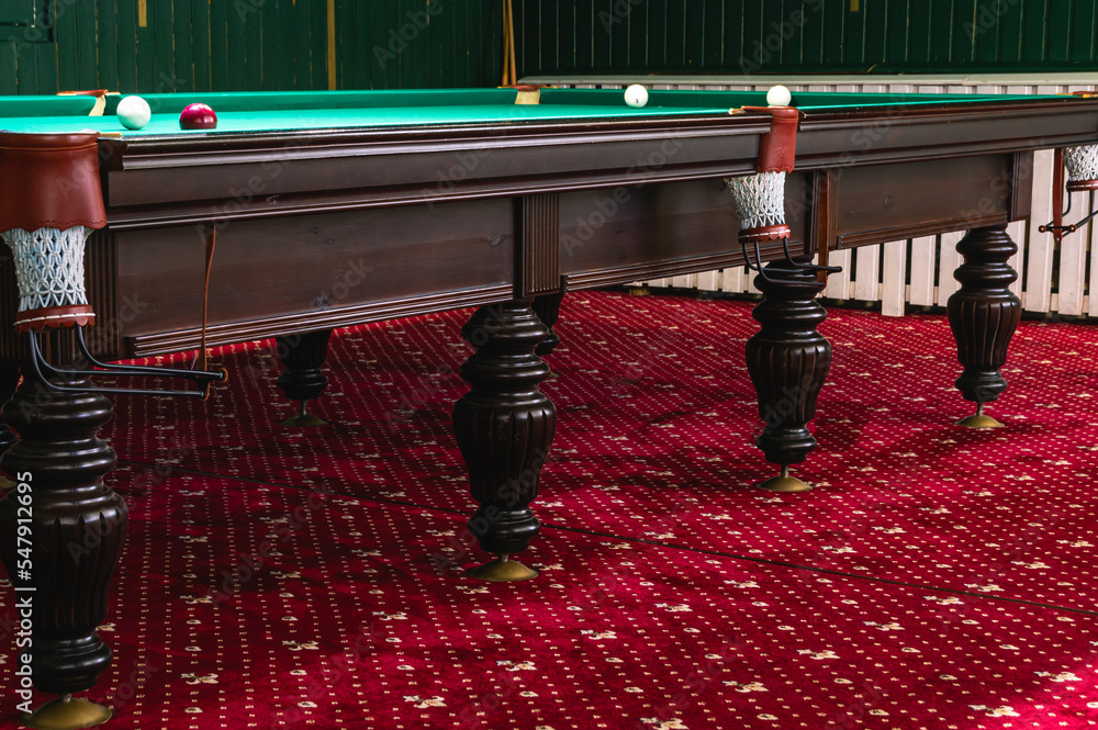 Billiard table with green cloth. Billiard room. Board game. Billiard ...