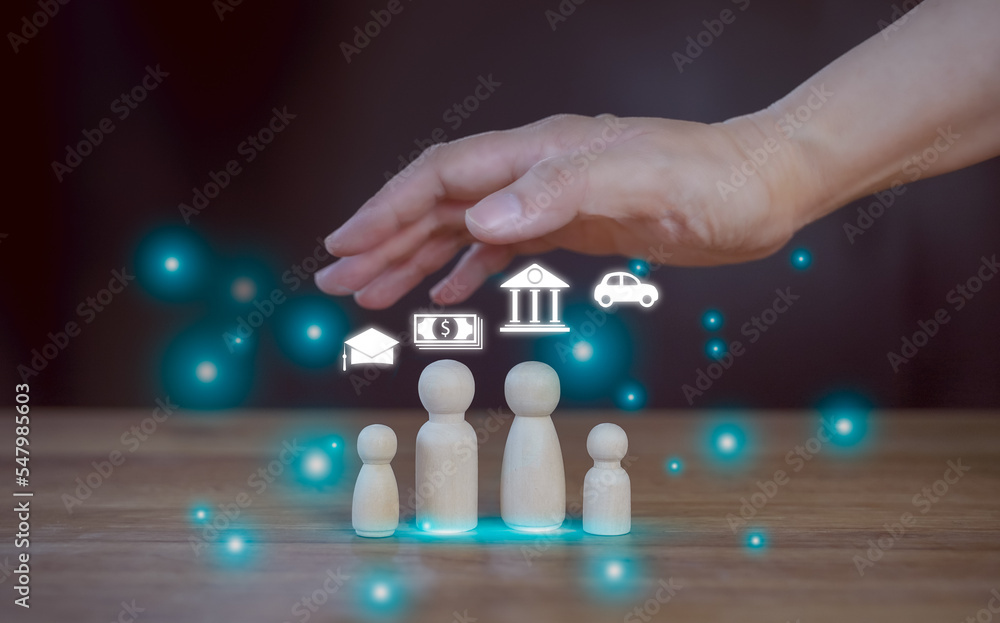 The man hands protect over wooden peg dolls family. Concept planning ...