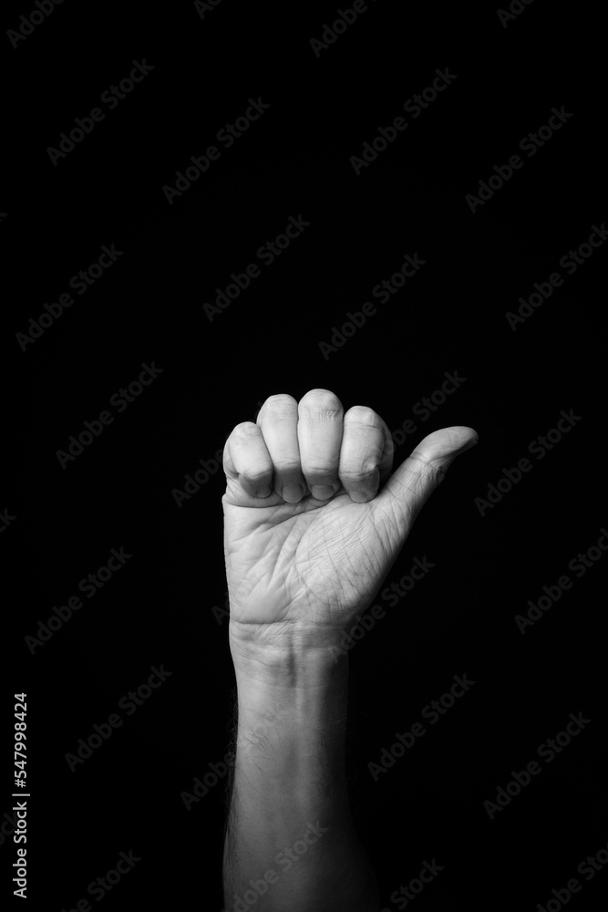 Hand demonstrating the French sign language letter 'A' with copy space ...