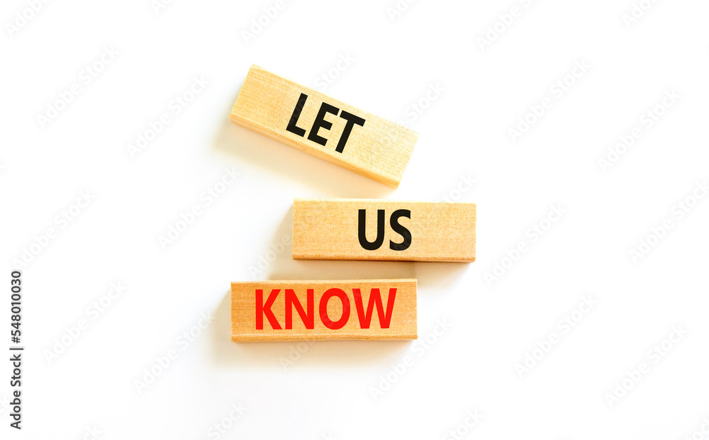 Let us know symbol. Concept words Let us know on wooden blocks on a ...