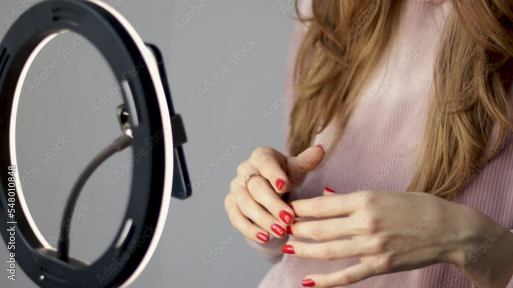 woman girl young blogger vlogger talking with followers hand holding ...