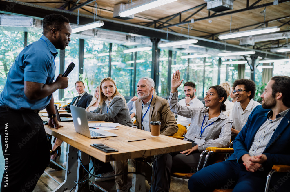 Cinematic image of a conference meeting. Stock Photo | Adobe Stock