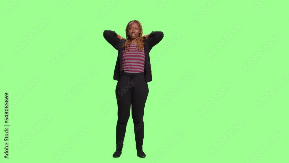 Angry girl with full body on greenscreen backdrop yelling and being ...