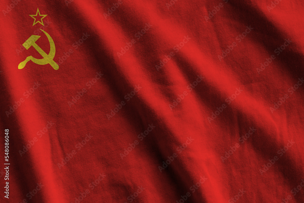 Soviet Union flag with big folds waving close up under the studio light ...