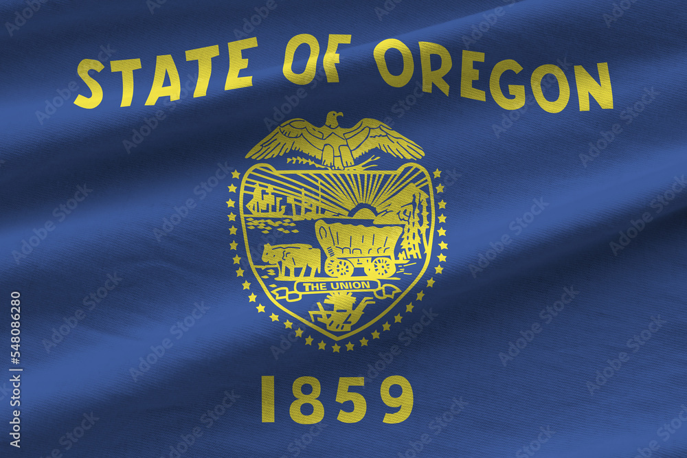 Oregon US state flag with big folds waving close up under the studio ...