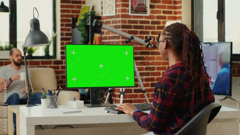 Office worker analyzing isolated greenscreen template on personal ...