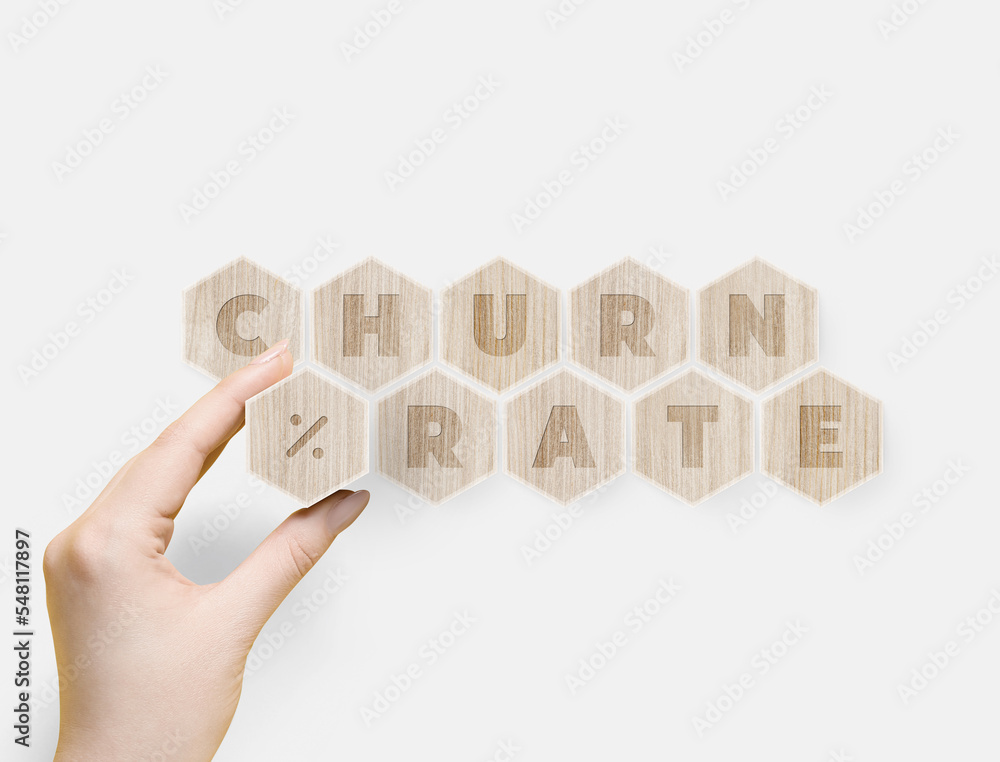 CHURN RATE - Wood grain hexagon with text "CHURN RATE" and hand-holding ...
