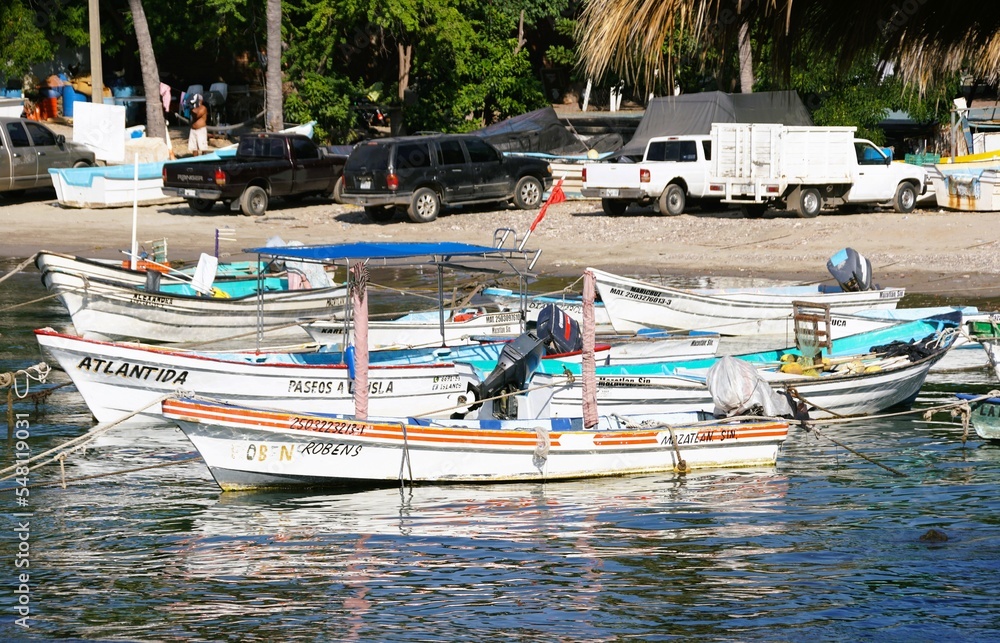 Mazatlan, Mexico - November 8, 2022 - The small boats docked by the bay ...