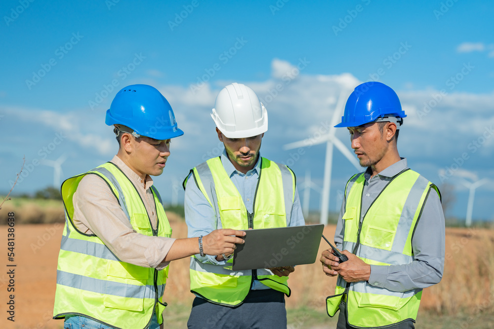 Asian engineers working in fieldwork outdoor. Workers walking and ...
