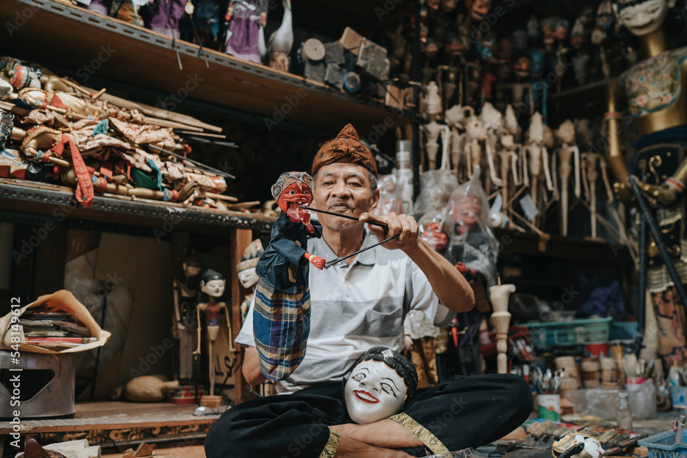 Dalang Wayang (Puppet Master) Wayang is a traditional form of puppet ...